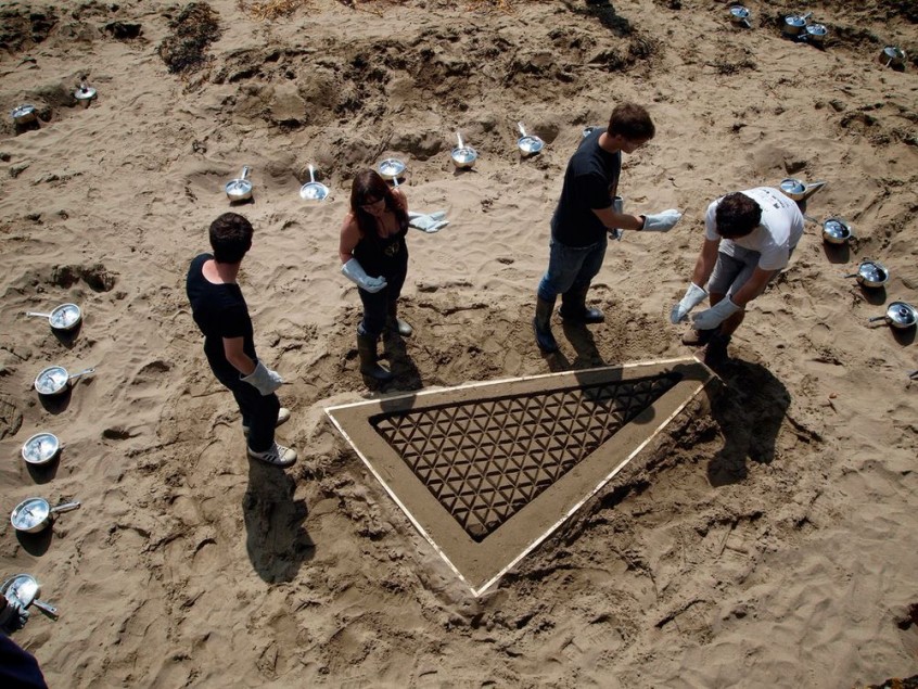 Geometric Desk Cast from Molten Pewter on a Beach by Max Lamb - Homeli